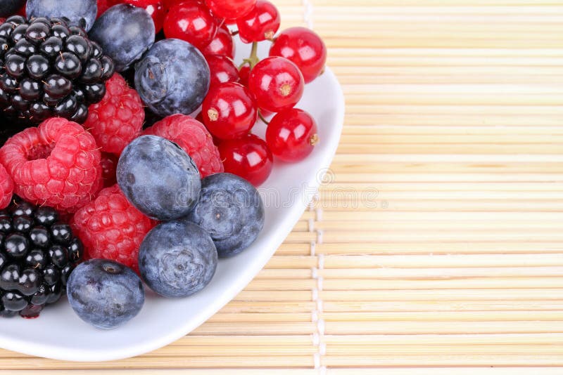 Assortment of Berries on Plate Stock Image - Image of bilberries ...