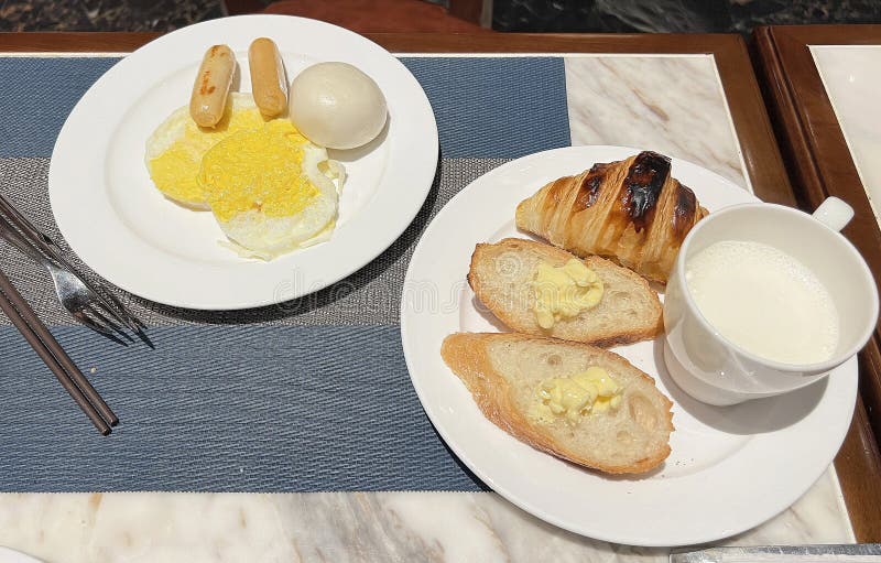 An Assortment of Breakfast Foods and Drinks on a Dining Table Stock ...