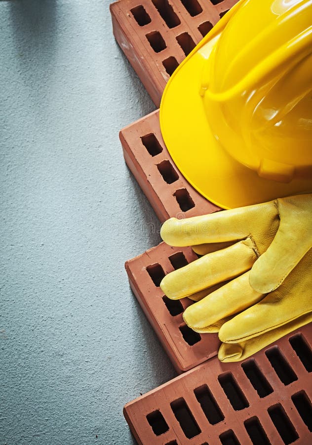 Assortment of Building Bricks Protective Cap Safety Gloves on Co Stock ...