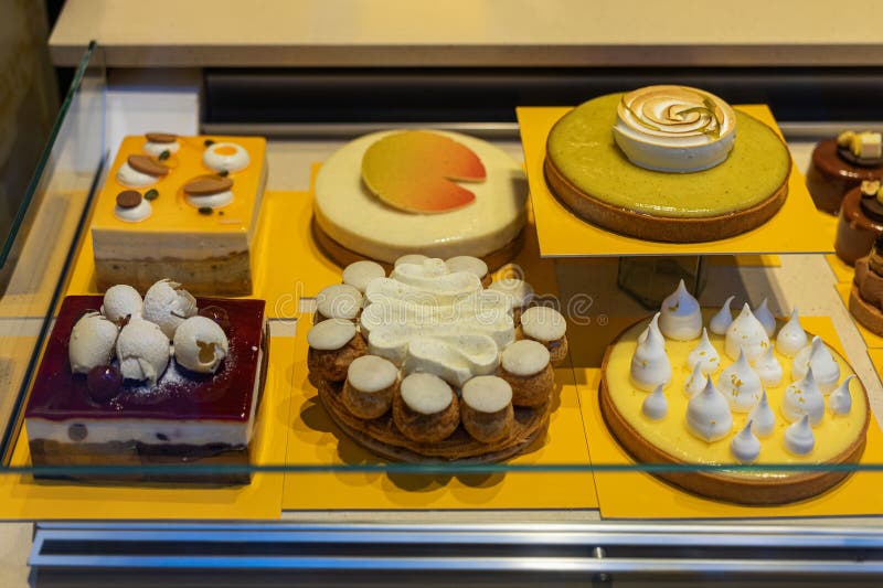 Assortment of Cakes Displayed in Bakery. Concept of Luxury Desserts and ...