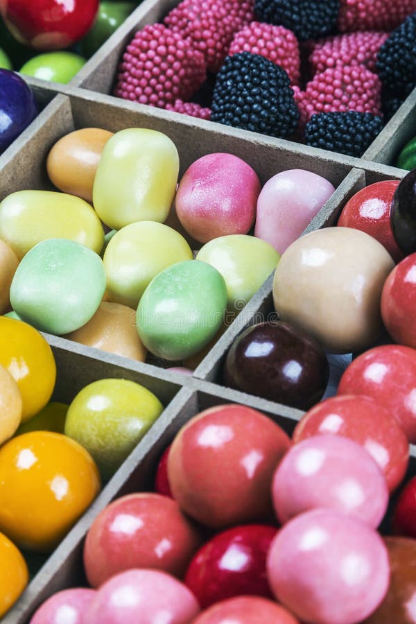 Assortment of Candy and Gum in a Wooden Box Stock Photo - Image of ...