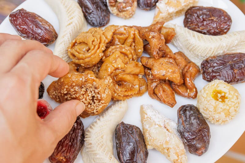 Assortment of Chebakias, Moorish Pasta and Dates, on a White Plate ...