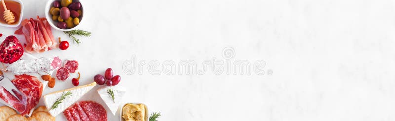Assortment of Cheese and Meat Appetizers, Corner Border on a White ...