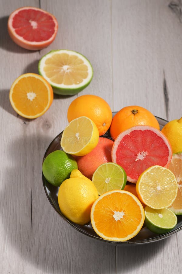 Assortment of Citrus Fruit on Wooden Table Stock Image - Image of food ...