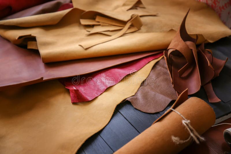 Assortment of Colorful Leather Pieces on Table Stock Photo - Image of ...