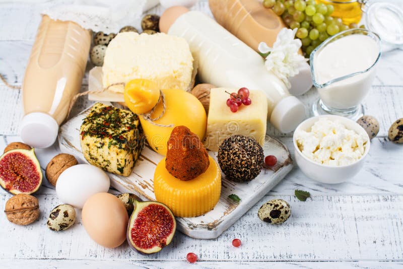 Assortment of Dairy Farm Products on Wooden Table Stock Photo - Image ...