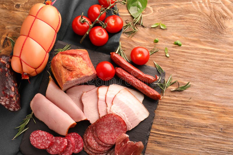 Assortment of Delicious Deli Meats on Slate Plate Stock Photo - Image ...