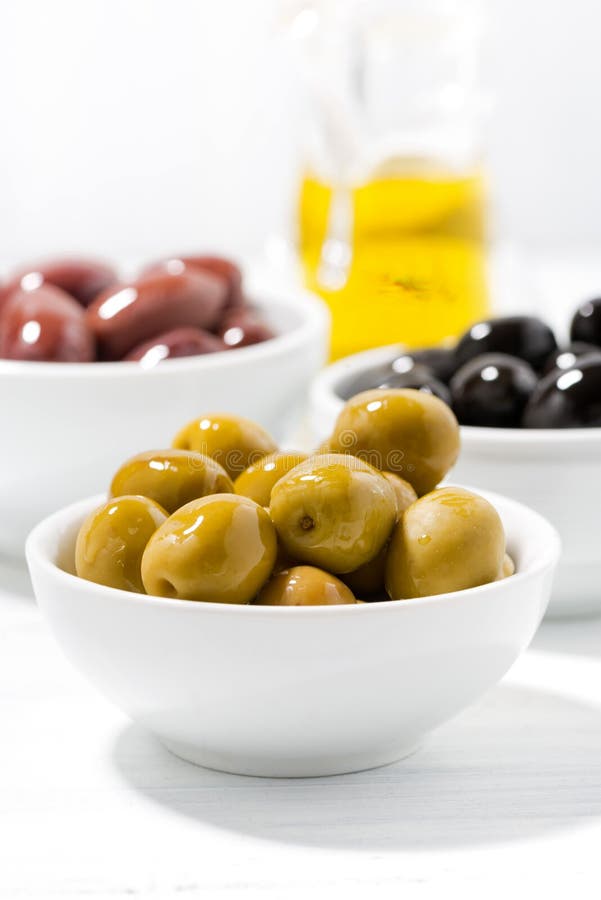Assortment of Different Kinds of Organic Olives on White Table Stock ...