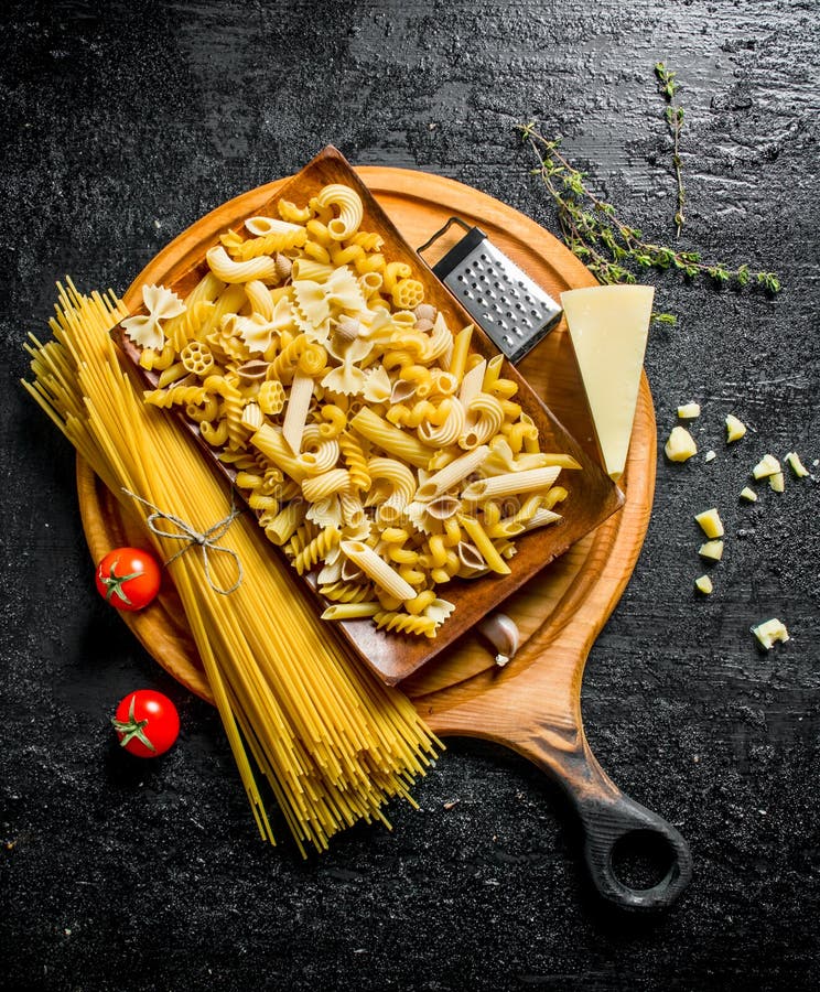 Assortment of Different Types of Raw Paste on a Cutting Board with ...