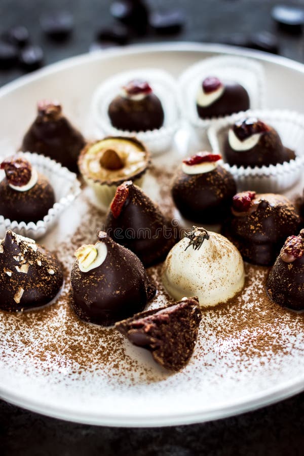 An Assortment of Fine Chocolates in White, Dark, and Milk Chocolate on ...