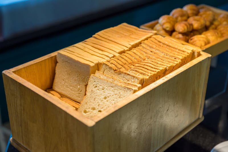 Assortment of Fresh Bread on Table in Buffet. Sliced White Bread Stock ...