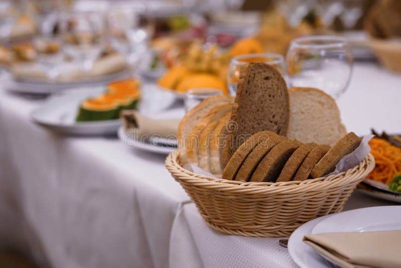Assortment of Fresh Breads on Dining Table Surrounded by a Lavish ...