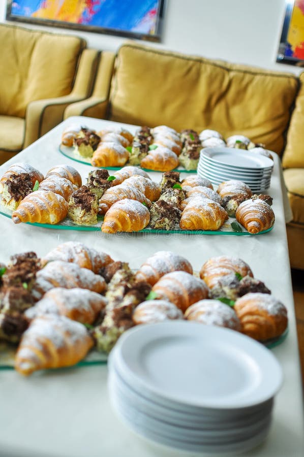 Assortment of Fresh Pastry on Table in Buffet. Croissants and Cakes ...