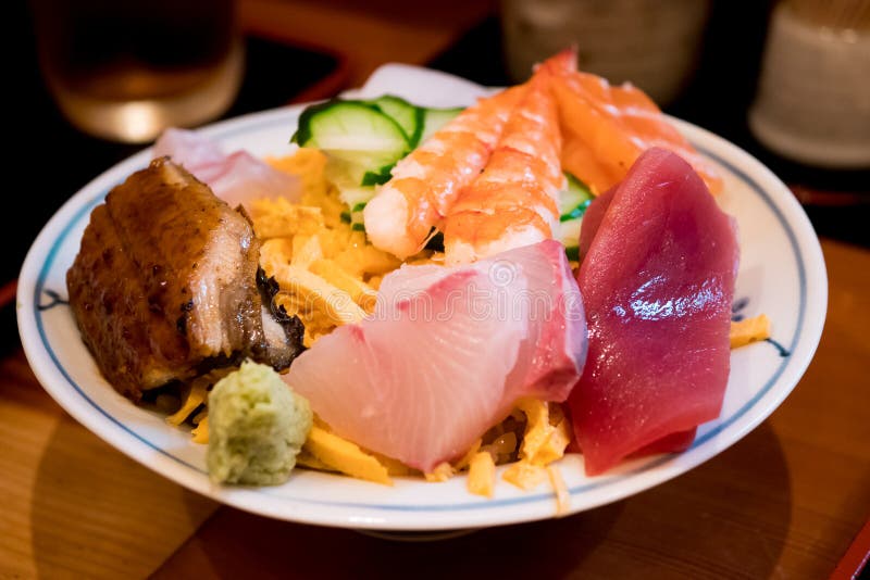 An Assortment of Gorgeous Sliced Raw Fish Stock Photo - Image of bowl ...