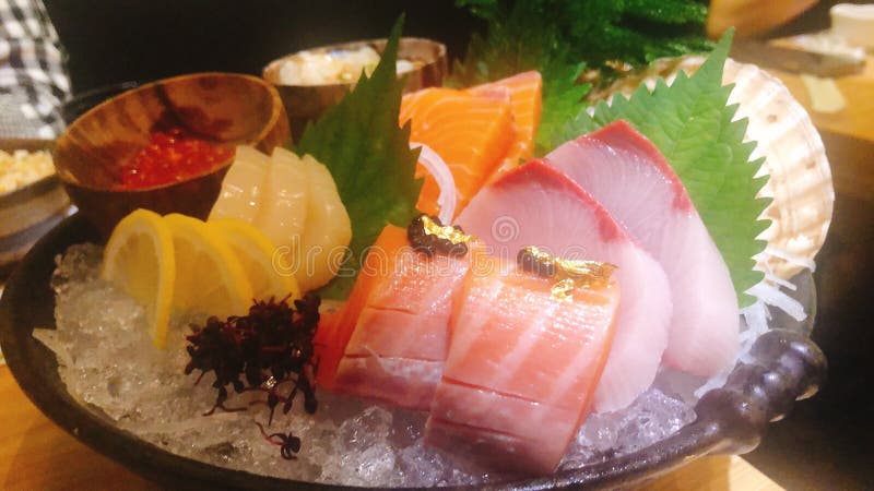 An Assortment of Gorgeous Sliced Raw Fish Stock Photo - Image of ...