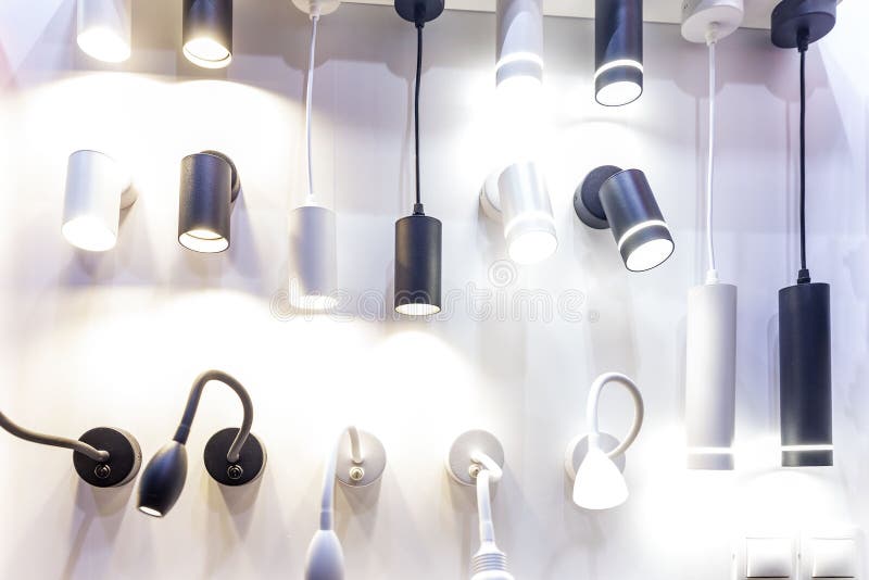 Assortment of Modern Lamps on the Wall in the Store. Front View Stock ...