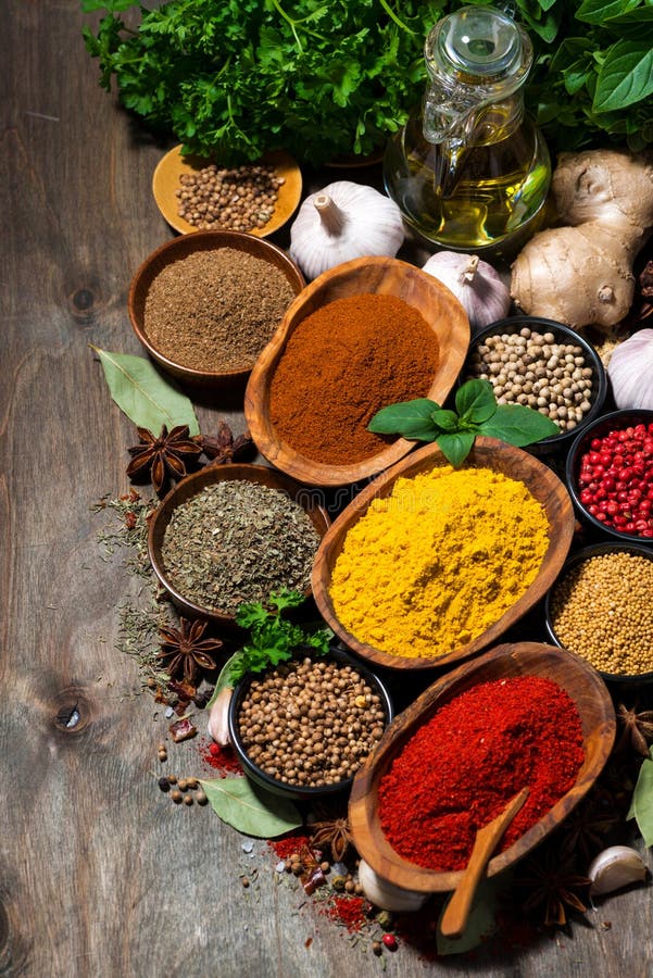 Assortment of Oriental Spices on a Wooden Background, Closeup Stock ...