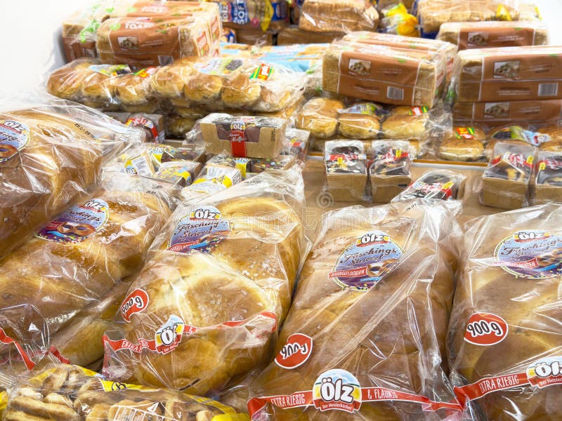 Assortment of Packaged Breads and Pastries on Display at Grocery Store ...