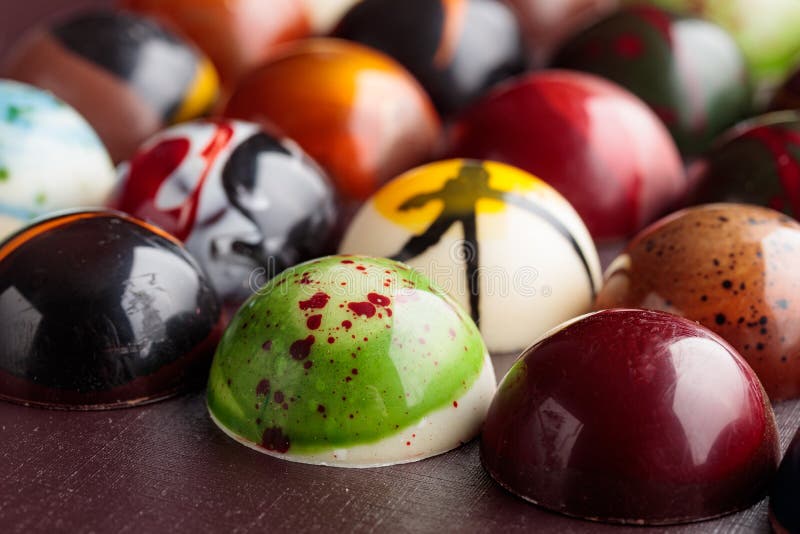 Assortment of Painted Handcrafted Chocolate Bonbons. Delicious Dessert ...