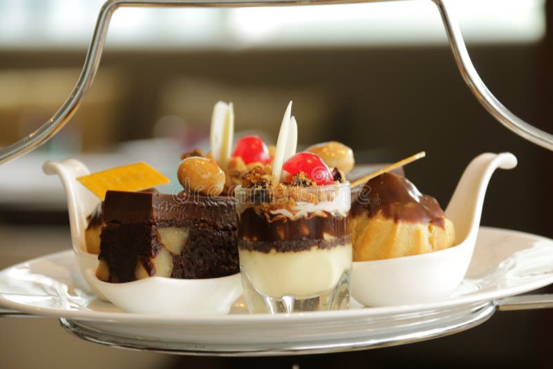 Assortment of Pieces of Cake in Plate Stock Photo - Image of tasty ...