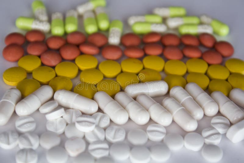 Assortment of Pills Divided by Color Stock Image - Image of assorted ...