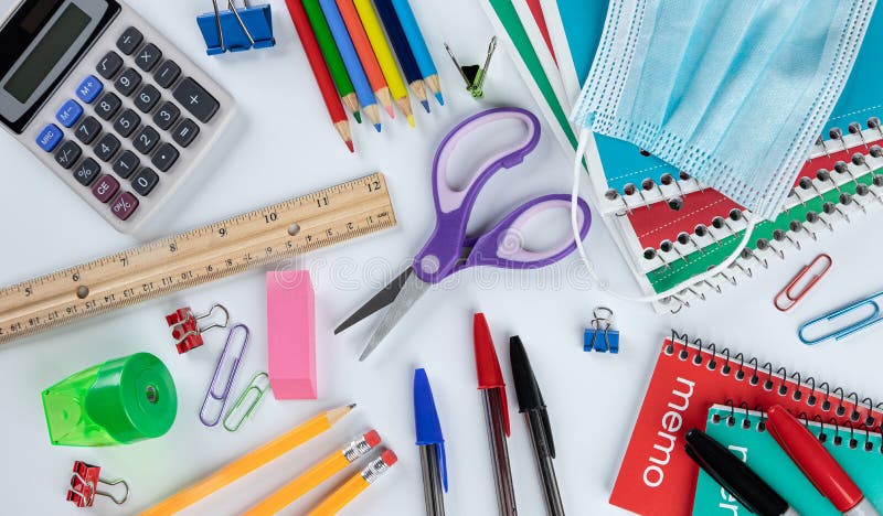 Assortment of School Supplies on a White Table Stock Photo - Image of ...