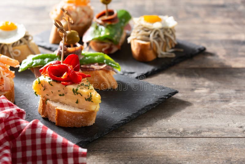 Assortment of Spanish Pintxos Stock Photo - Image of anchovy, toast ...