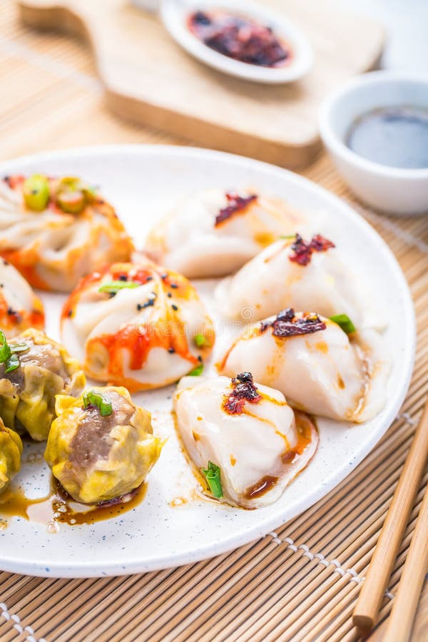 Assortment of Steamed Dumplings Dim Sum on Kitchen Table Stock Image ...