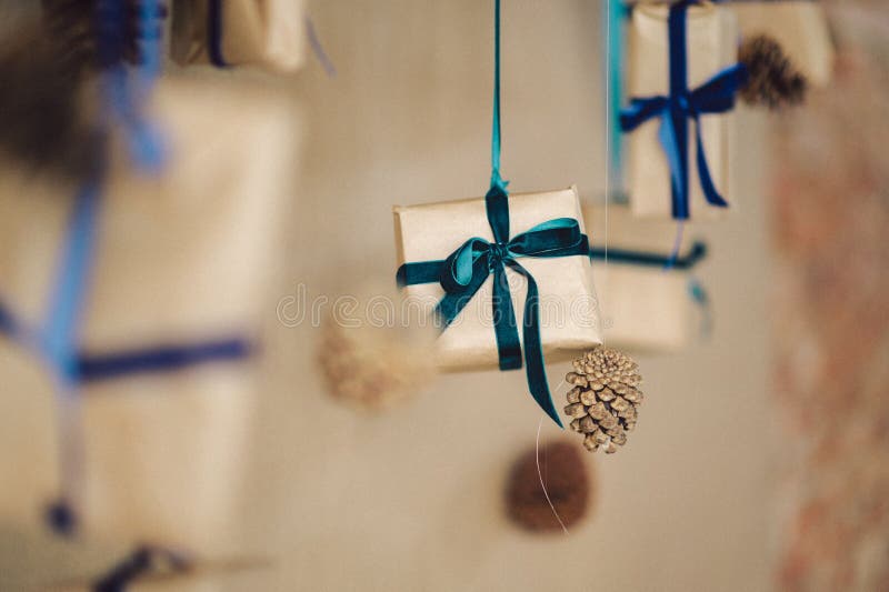 Assortment of Suspended Christmas Present Boxes Hanging from the ...