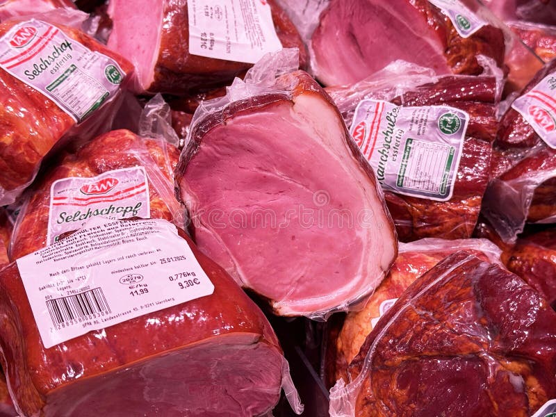 Assortment of Vacuum-packed Ham with Labels in Store Display Editorial ...