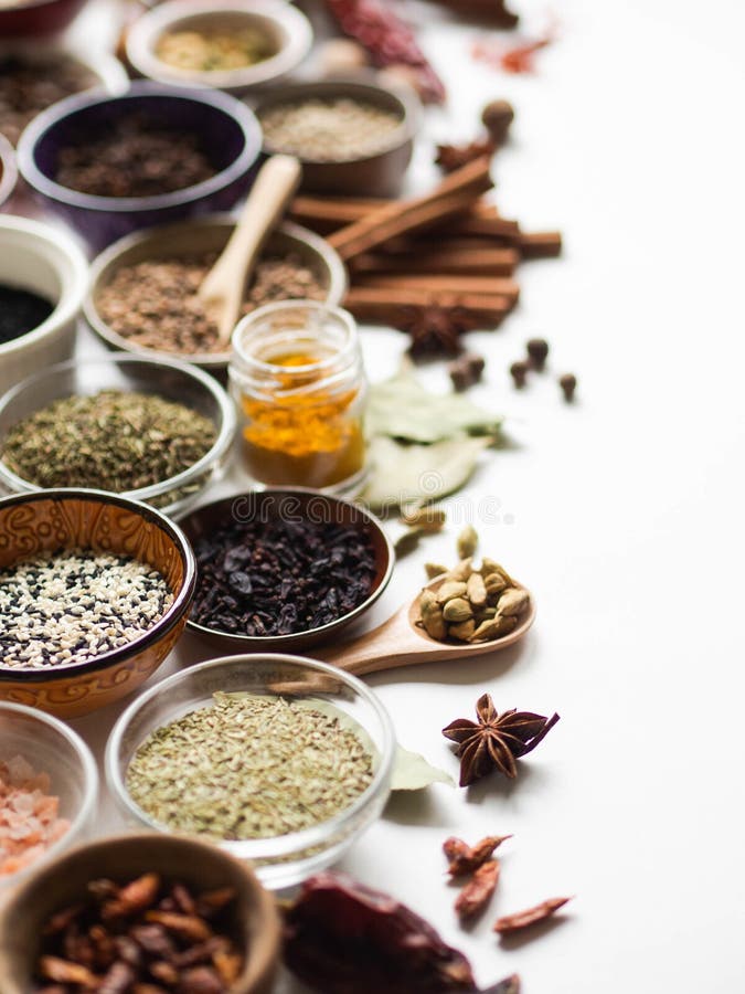 Assortment of Various Dry Spices in Small Bowls on a White Background ...