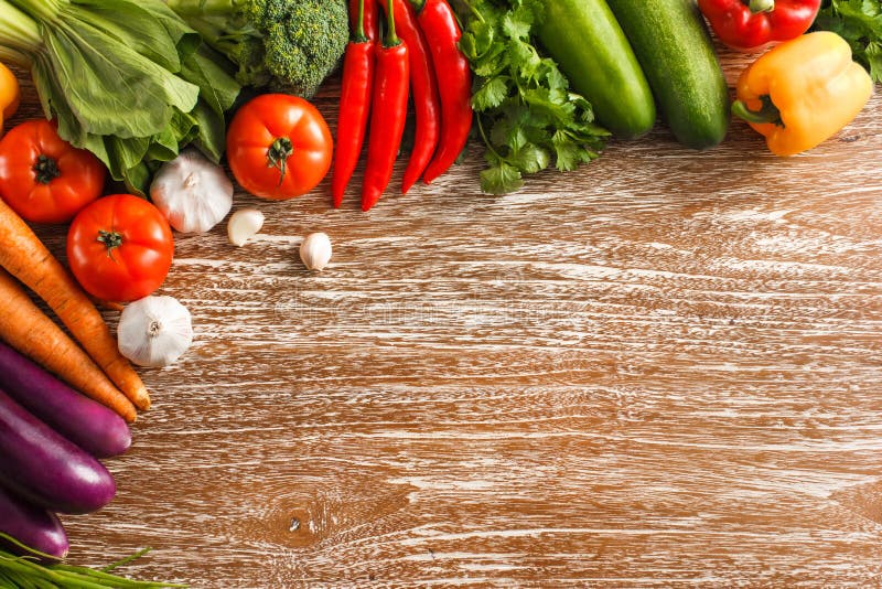 Assortment of Various Fresh Vegetables on Rustic Wooden Table Stock ...