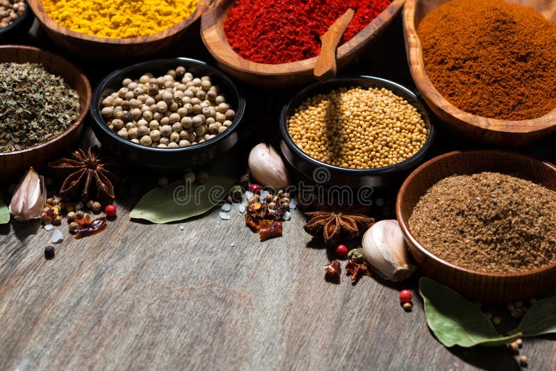 Assortment of Various Spices on a Wooden Table, Closeup Stock Photo ...