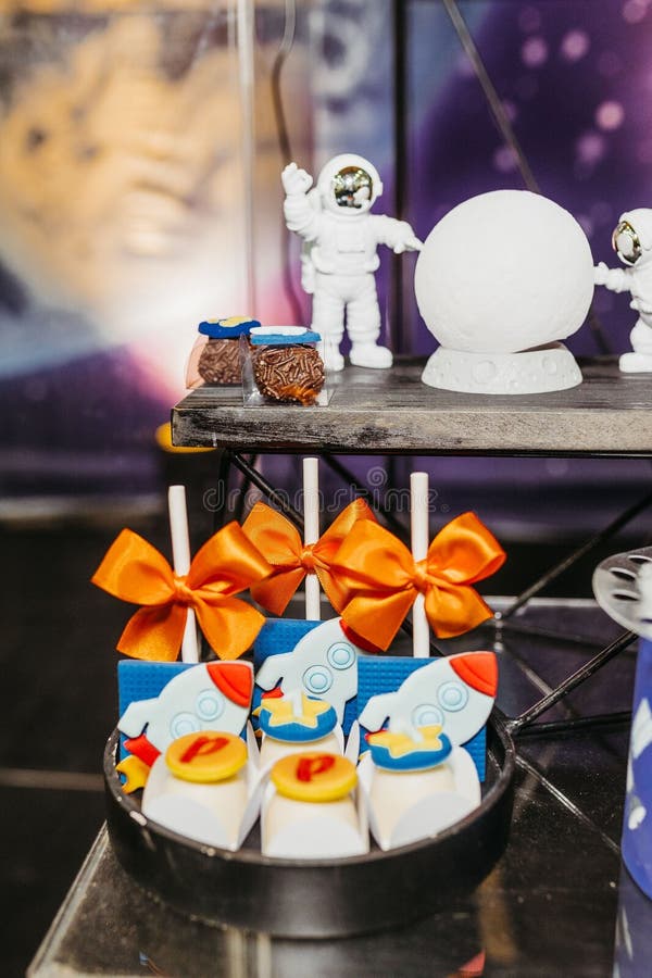 Array of Colorful Cake Pops with Rocket Designs on a Countertop Stock ...