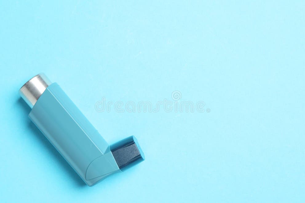 Asthma Inhaler on Light Blue Background, Top View. Space for Text Stock ...