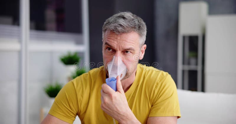 Asthma Patient Breathing Using Oxygen Mask Stock Image - Image of ...