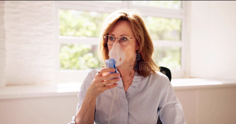 Asthma Patient Breathing Using Oxygen Mask Stock Photo - Image of ...