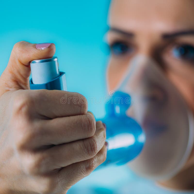 Asthma. Woman with Inhaler stock image. Image of medication - 206171631