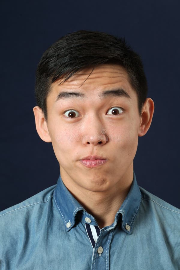 Young Asian Man Rising Eyebrows Stock Photos - Free & Royalty-Free ...
