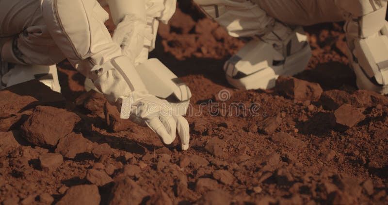 Astronaut Examining Rock on Mars Stock Image - Image of science, rock ...