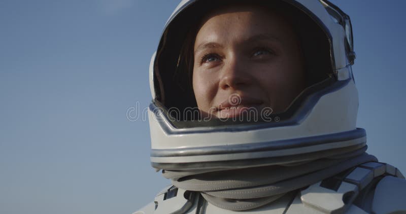 Astronaut opening helmet stock image. Image of scientific - 153418609