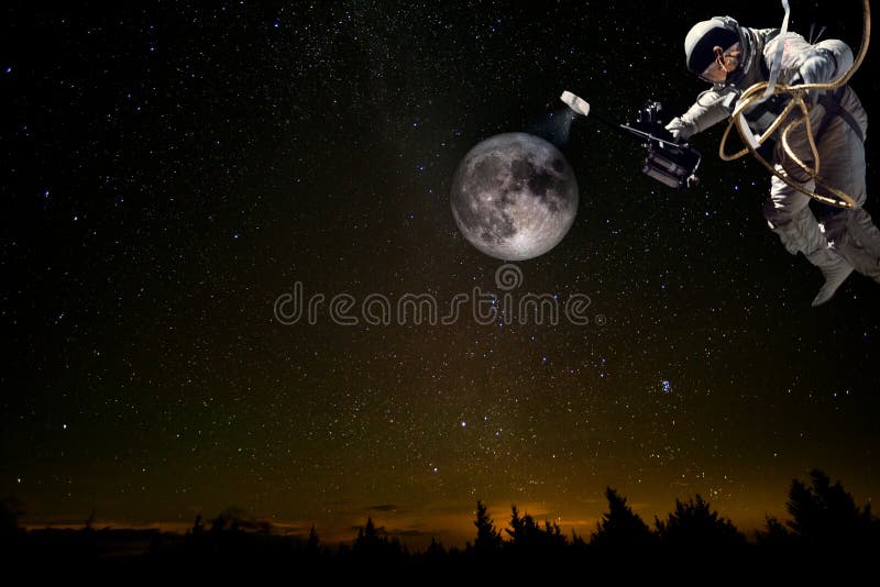 Astronaut in Outer Space Explores the Moon, Illuminating it with Pocket ...