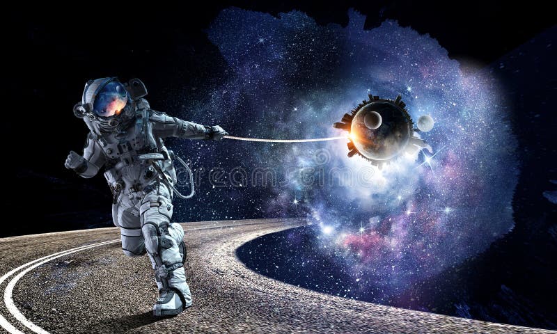 Fantasy Image with Spaceman Catch Planet. Mixed Media Stock Photo ...
