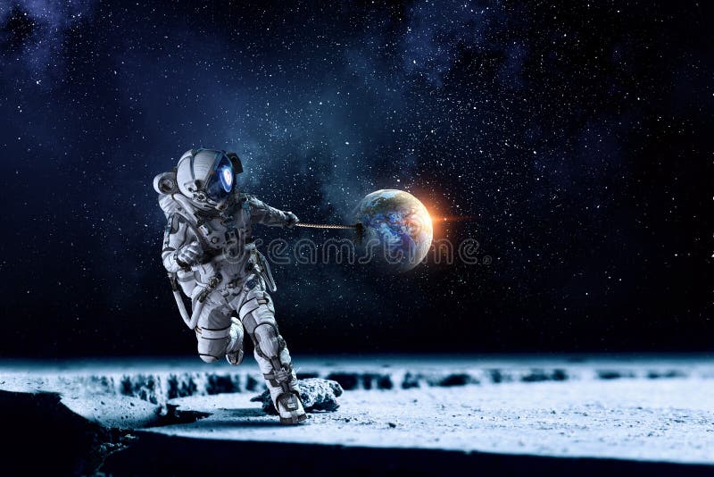 Fantasy Image With Spaceman Catch Planet. Mixed Media Stock Photo ...
