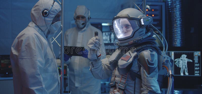 Astronaut and Scientists Testing Equipment Maintenance Stock Photo ...