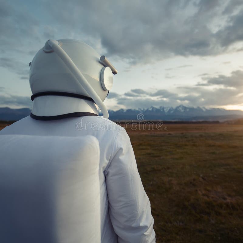 Astronaut in a Spacesuit Explores an Unknown Planet Stock Photo - Image ...