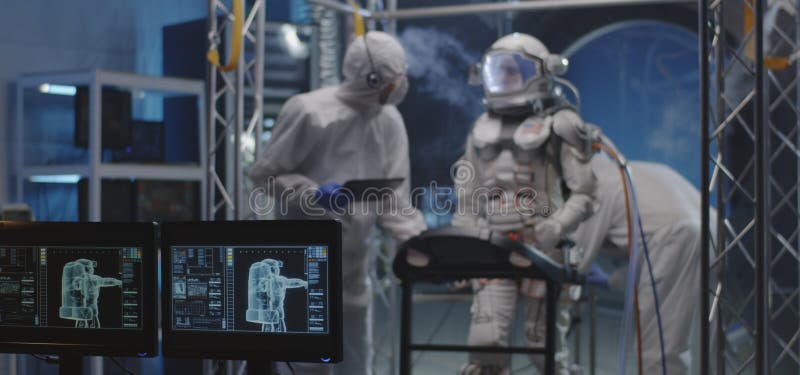 Astronaut Walking on a Treadmill Stock Photo - Image of monitors ...