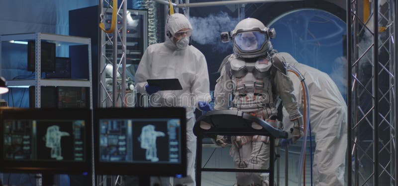 Astronaut Walking on a Treadmill Stock Photo - Image of walking ...