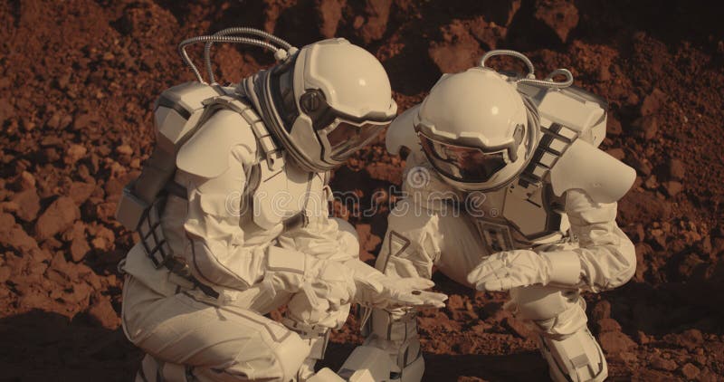 Astronauts Collecting Rock Samples on Mars Stock Photo - Image of ...