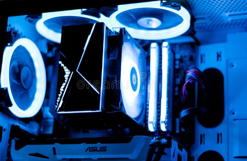 ASUS Computer on a Desk, with a Cooling Fan Providing Ventilation ...